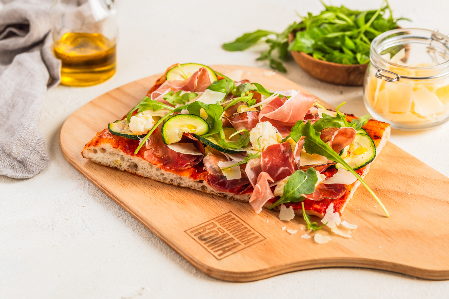 Authentic Roman pizza made with a lot of amore | Mamma Roma